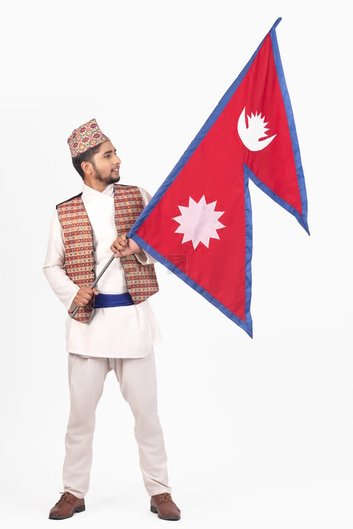 A handsome guy holding Nepalese national flag - Photos Nepal