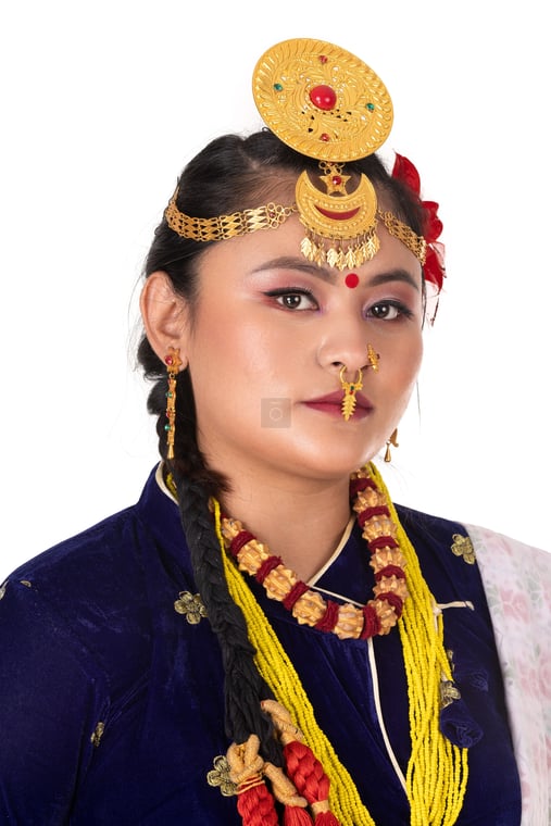 A close-up shot of a gloomy woman wearing traditional Rai attire and ...