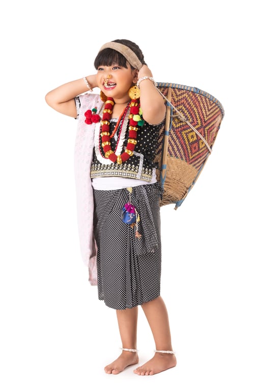 a cute little child with cultural Rai attire carries doko with ...