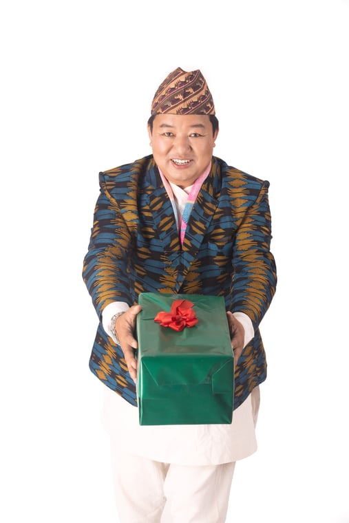 A dashing man is thrilled to show off his gift. - Photos Nepal