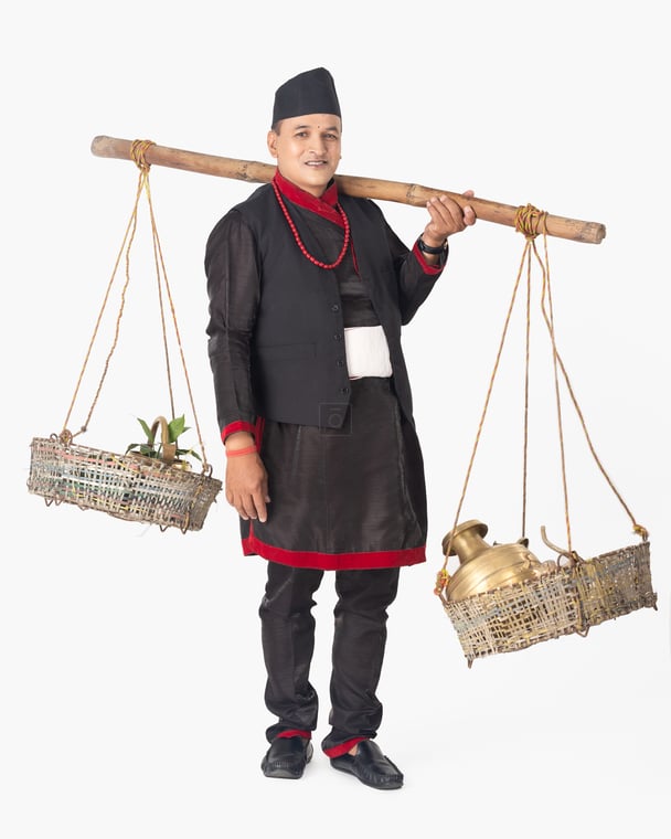 A dashing native Newari man posed sideways while holding a kharpan ...