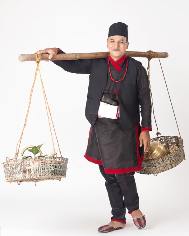 A handsome local Newari man carrying a kharpan - Photos Nepal