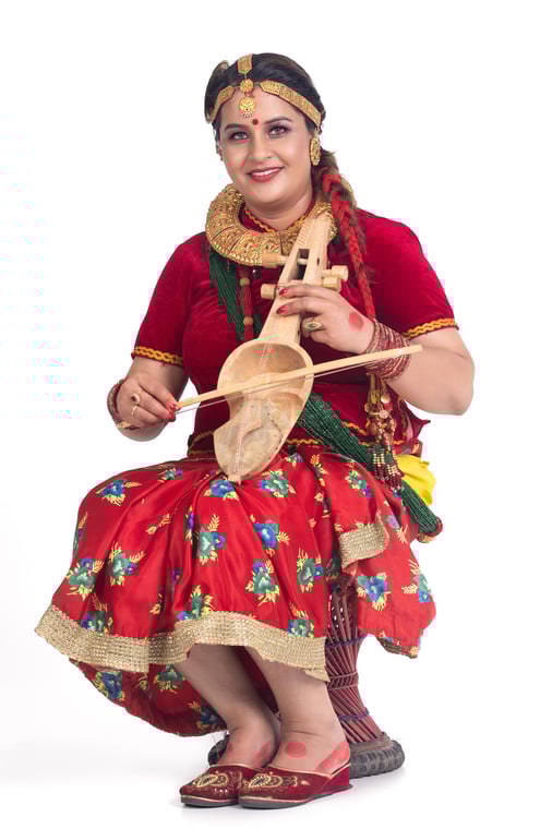 A happy and exciting traditional woman playing the sarangi - Photos Nepal