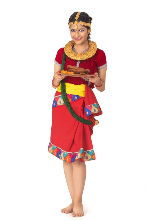 A happy and religious Hindu girl carrying a Puja thali and Prasad ...
