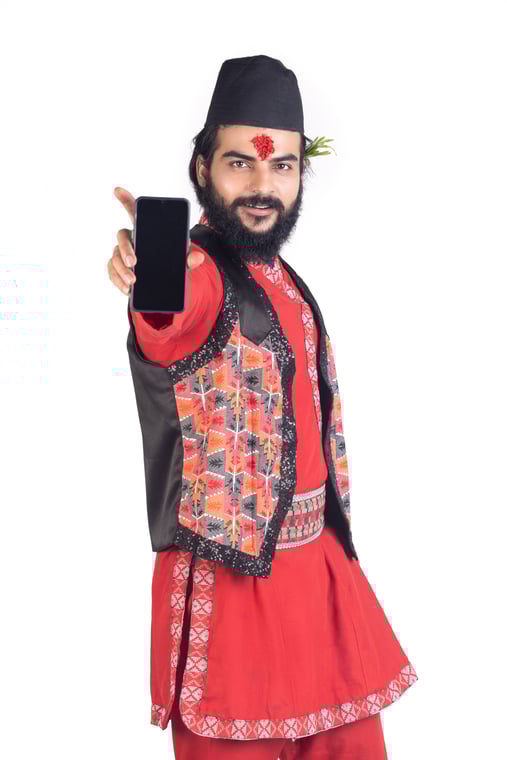 A joyful young lad enjoying Dashian and displaying his smartphone ...