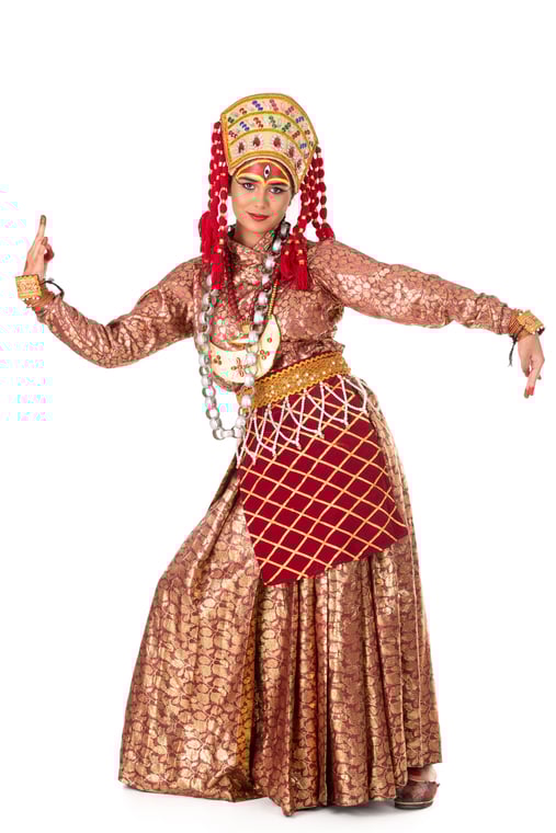 A majestic Nepalese goddess Kumari poses in a classical dancing step ...