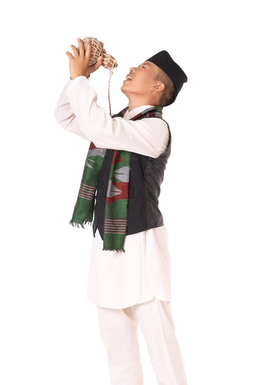 A Mongolian young boy from Rai community holding Chindo - Photos Nepal