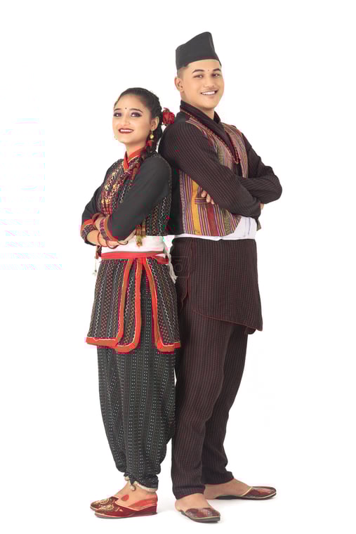 A Newari couple posing back to back while smiling and folding their ...