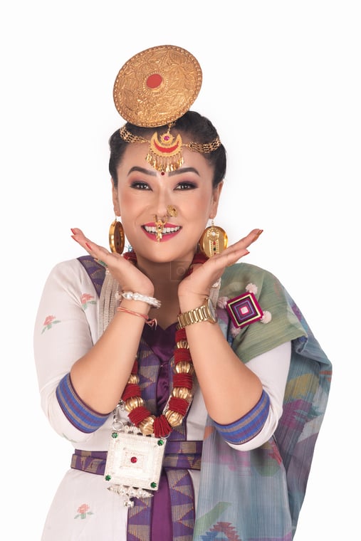 A pretty Limbu woman with a sweet smile, dressed in traditional and ...