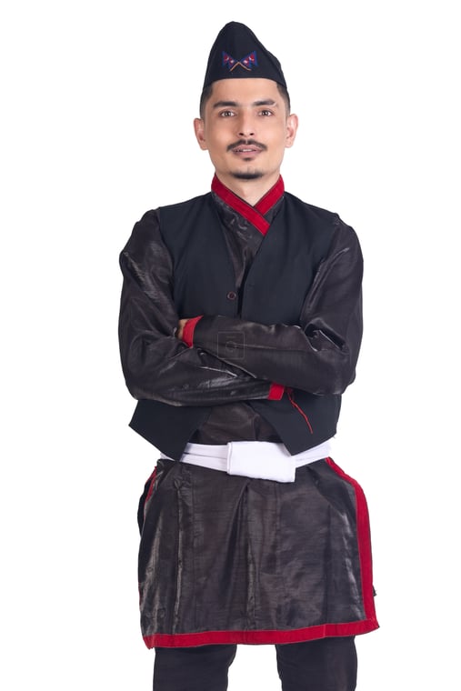 A proud and confident Newari boy folding his hands and wearing Newari ...