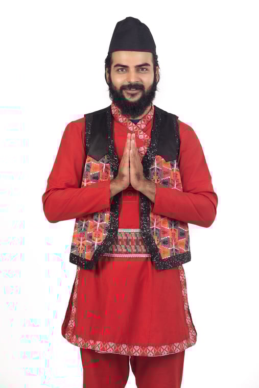 A proud traditional boy doing Namaste greetings - Photos Nepal