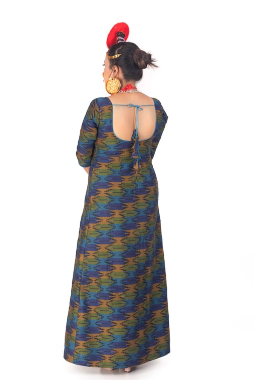 A stunning young woman wearing Dhaka clothes turns her back while ...