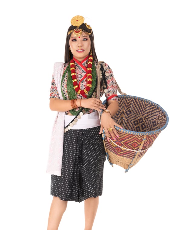 A traditional Rai woman holding doko while wearing cultural outfit ...