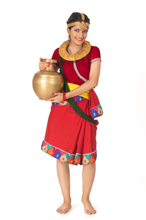 A traditional young girl carrying Gagro while wearing cultural Bahun ...