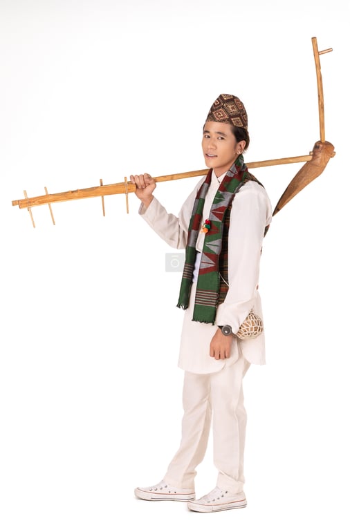 A young boy from Rai community carrying Halo - Photos Nepal