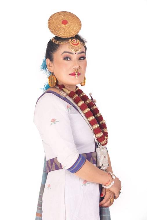 Adorable Limbu woman posing sideways for the camera in a traditional ...
