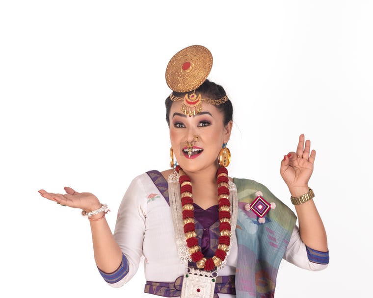 Gorgeous traditional Limbu girl with a surprising expression and hand ...