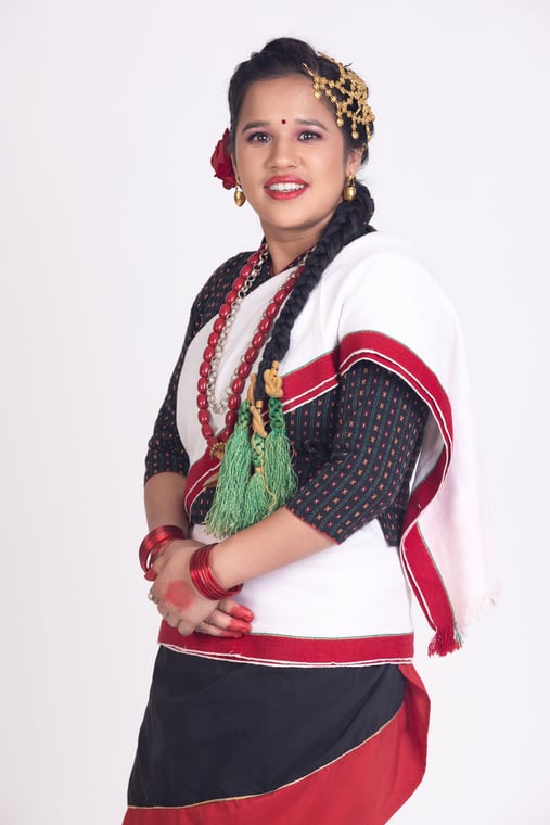 Traditionally dressed Newari woman posing sideways for the camera ...
