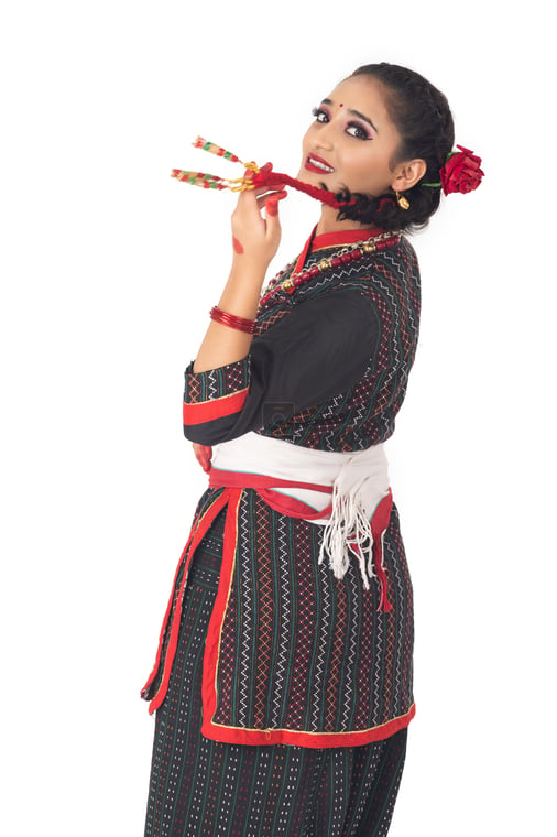 A cute Newari girl with a traditional Newari outfit poses for camera ...