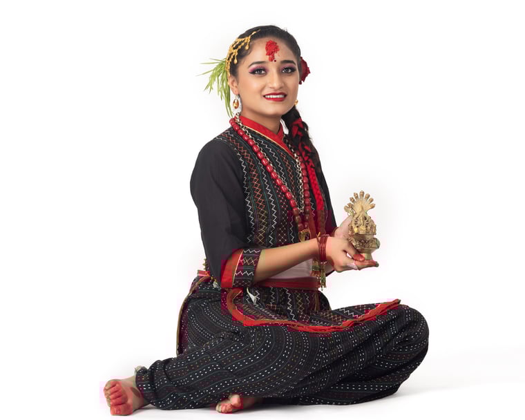 a devoted Newari girl holding a Sukunda oil lamp - Photos Nepal