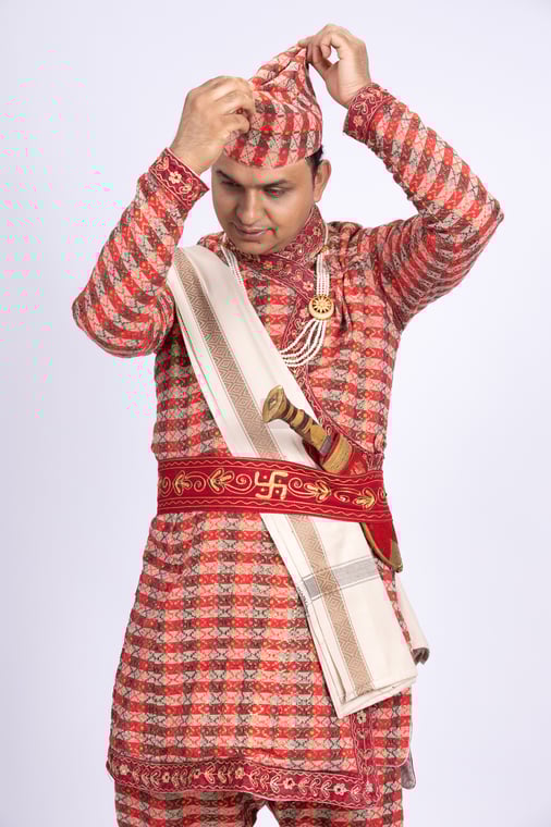 Adjusting his Dhaka Topi: A Handsome Nepali Groom in Behula Dress ...