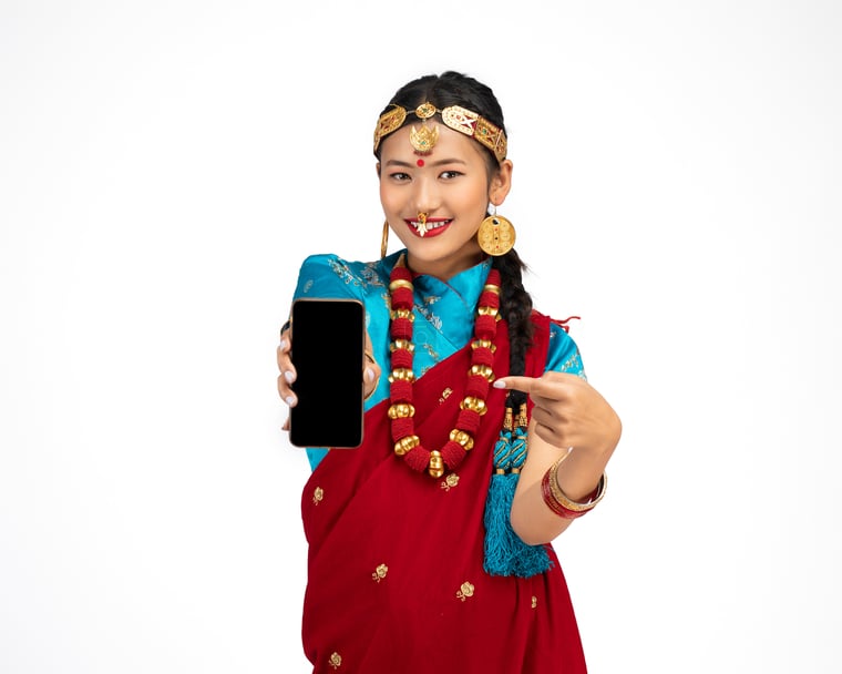 Beautiful Magar Girl Showcasing her Phone with a Smile - Photos Nepal