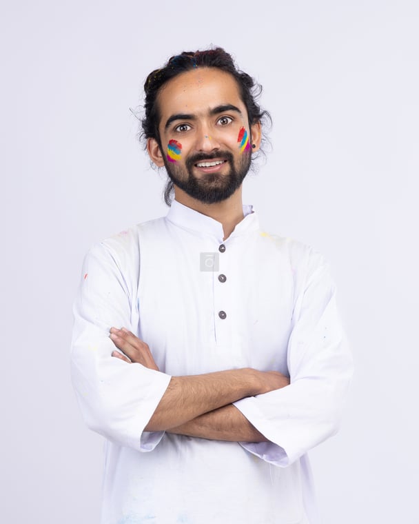 Celebrating Holi with Confidence: Nepali Man in Colored Face with ...