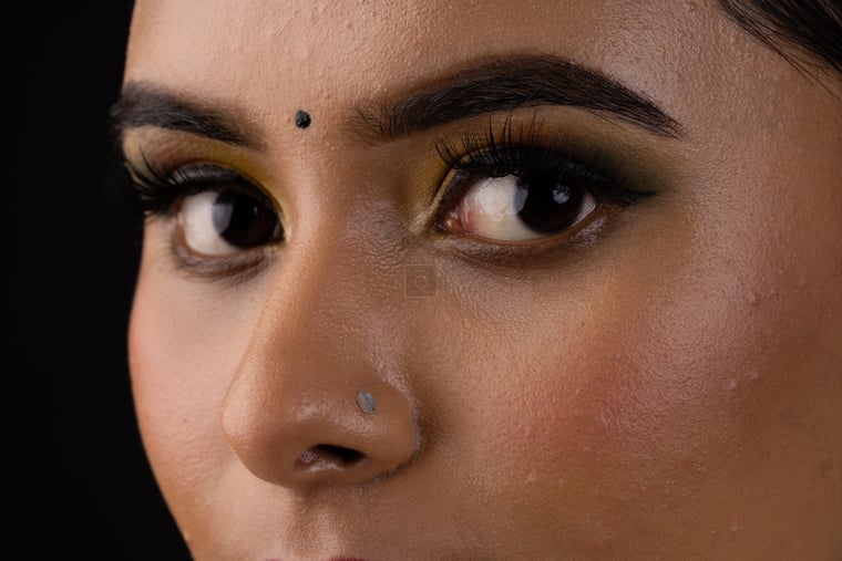 Closeup of Beautiful Dark-Eyed Tharu Girl - Photos Nepal