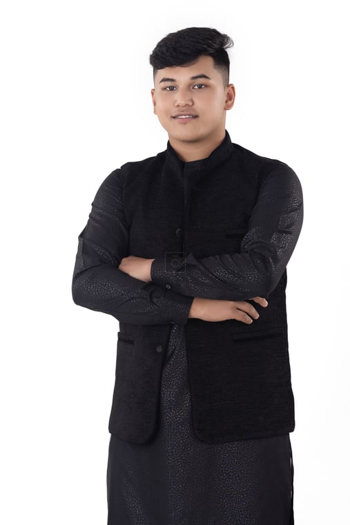 Confident Young Pakistani Man in Black Shalwar Kameez and Waistcoat ...