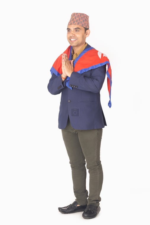 Full length photo of Man doing Namaste Covered with National flag of ...