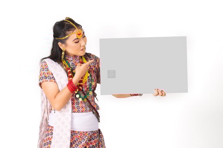 Kirati Rai Woman Holding Placard and Pointing for Copyspace - Photos Nepal