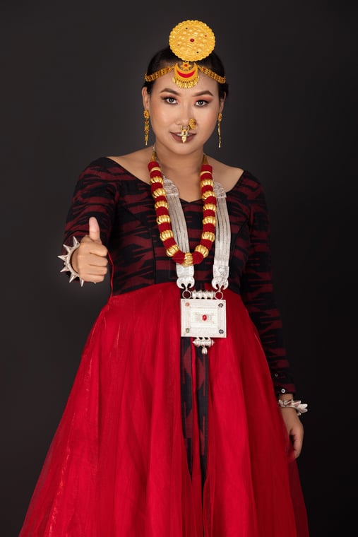 Limbu Lady showing approval with like gesture in traditional attire ...