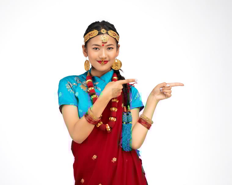 Magar Girl Points to the Right in Mid-Shot Photo - Photos Nepal