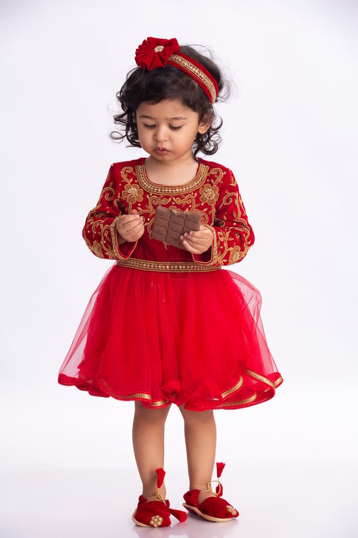 Nepali Baby Girl in Traditional Red Pasni Outfit Savors Delicious ...