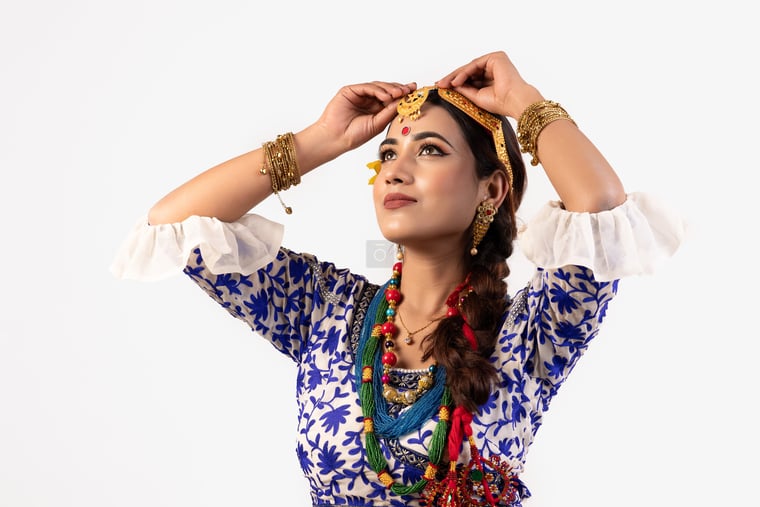 Nepali girl looking up with Sirbandi on forehead and traditional ...