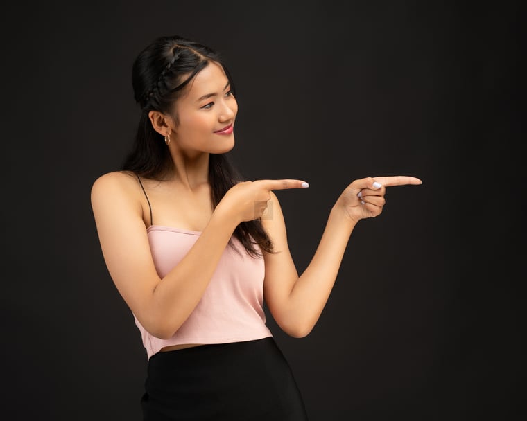 Nepali Girl Pointing Right with Both Index Fingers - Photos Nepal