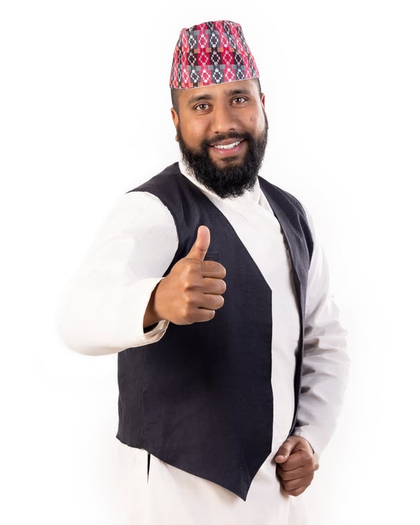 Nepali Man in Dhaka Topi Expressing Approval with Thumbs Up - Photos Nepal