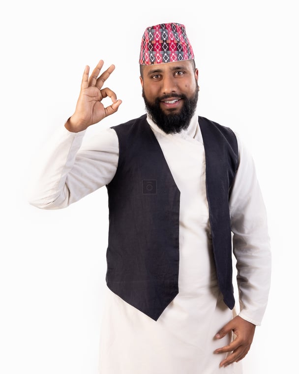 Nepali Man in Traditional Dress Showing Positive Gesture - Photos Nepal