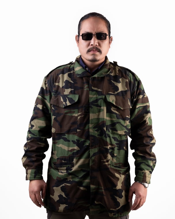 Nepali pride: Man in army jacket and vintage glasses showcases his ...