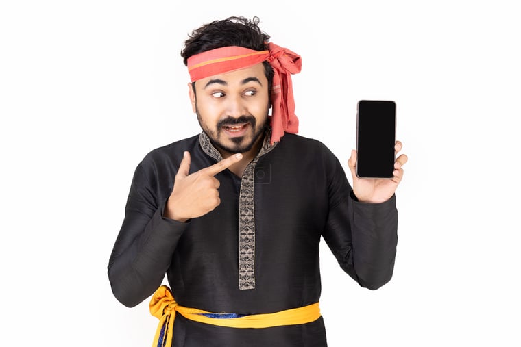 Nepali Terai man pointing on mobile screen - Photos Nepal