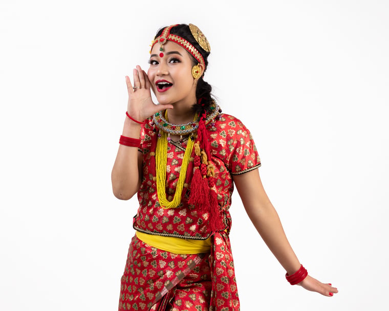 Open mouth Nepali woman sharing a secret with hand gesture - Photos Nepal