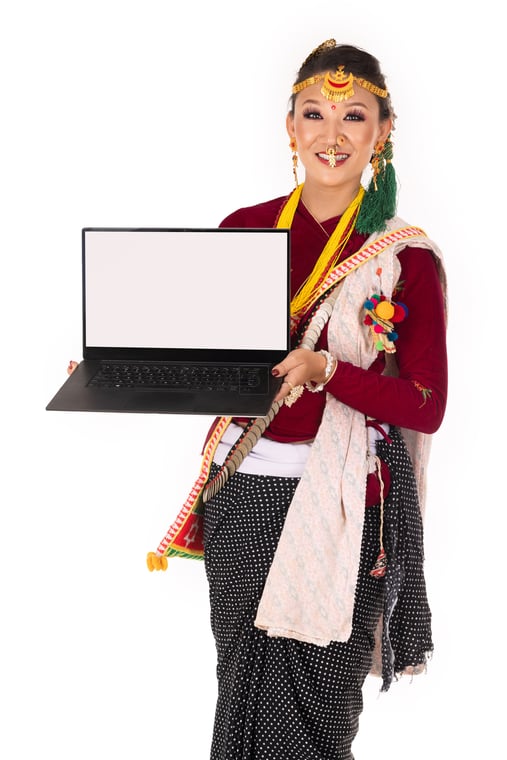 Rai girl with laptop showing copyspace, wearing traditional dress ...