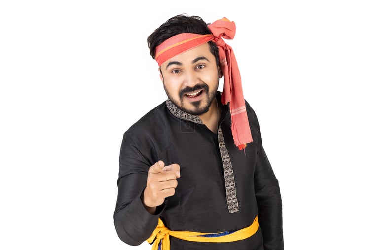 Smiling Nepali Terai man pointing to camera - Photos Nepal