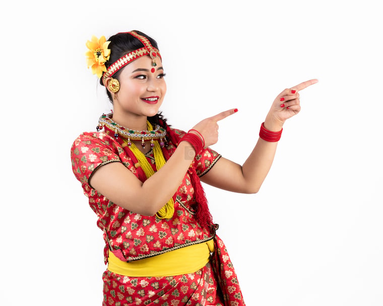 Smiling Nepali Woman Pointing to Side with Fingers - Photos Nepal