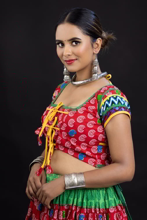 Smiling Tharu Girl in Cultural Attire and Jewelry - Photos Nepal