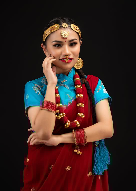 Studio portrait of a beautiful Magar girl in traditional attire ...