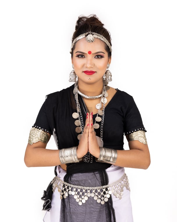 Tharu Girl in Traditional Tharu Dress Doing Namaste - Photos Nepal