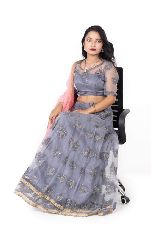 Young Nepali Girl Sitting on Boss Chair with Confident Look - Photos Nepal