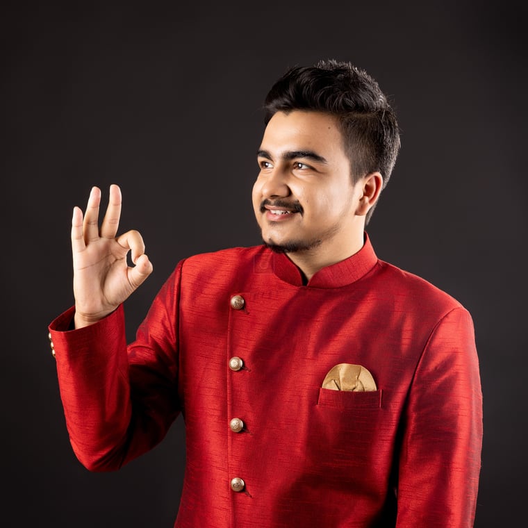 Young Nepali Man Showing 'Likes' Gesture with a Smile - Looking Left ...