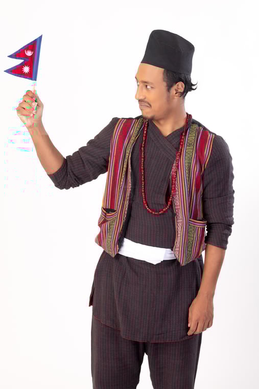 A Handsome Newari man looking at National Flag - Photos Nepal